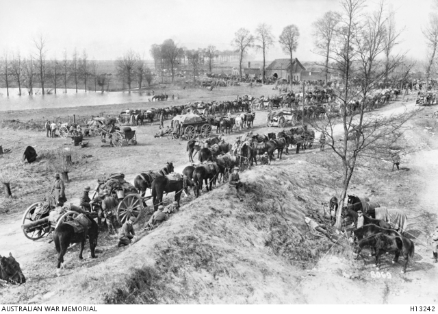 France. March 1918. German Army columns halted at a small town on their ...