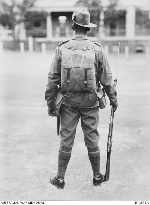 A WWI AIF soldier displaying the rear view of an Australian 1915 ...