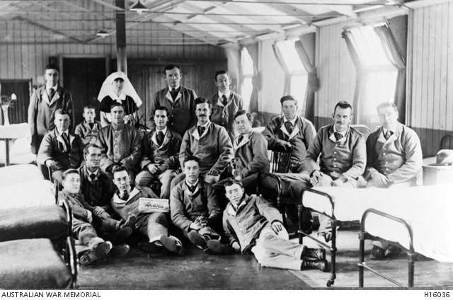 Harefield, England. 1918. A nursing sister and a group of patients in ...