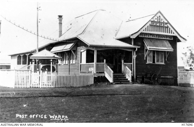 Warra, Queensland. The town's Post Office with a WWI War Memorial in ...