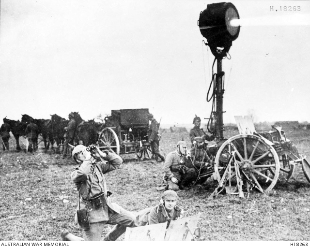 A German Army searchlight detachment in action. Electrical supply is ...