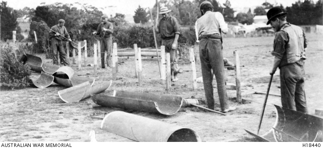 Broadmeadows, Victoria. Workmen building horse troughs at the ...