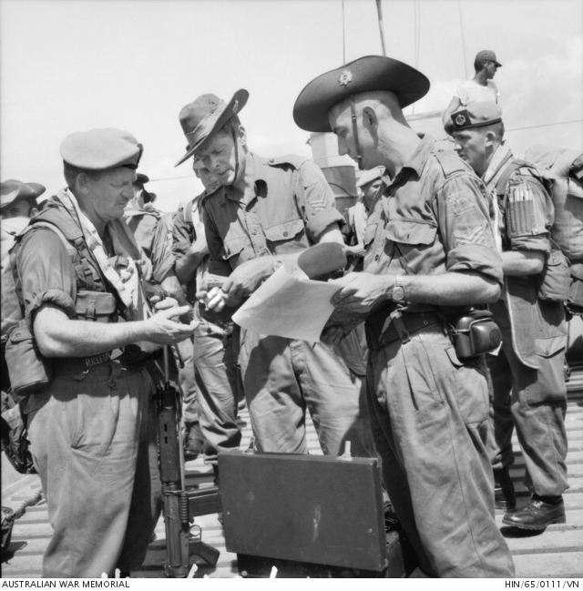 Vietnam. 1965. Pay Sergeants Frank Betts and Kevin Donaldson, issue ...