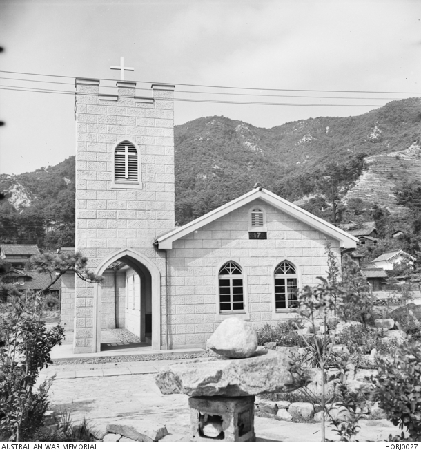 Exterior view of a European style stone church set in a Japanese style ...