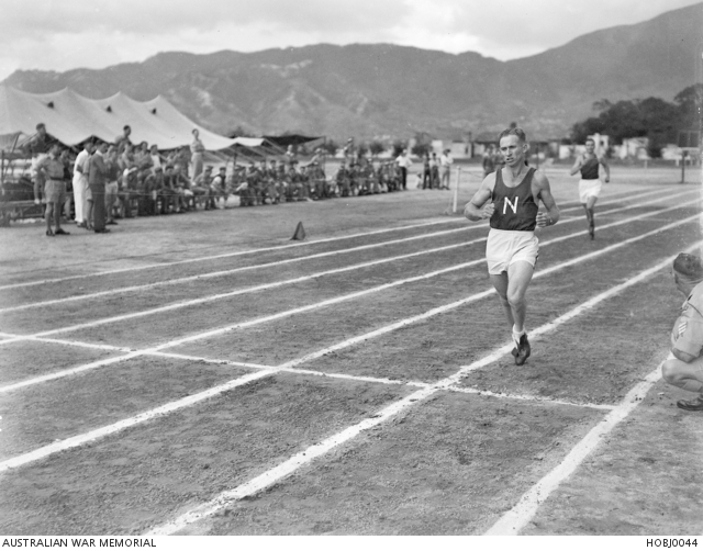 Runners competing in an athletics competition held at Anzac Park. The ...