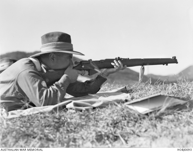 An unidentified Australian soldier taking aim with his .303 rifle ...