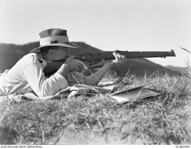 An unidentified Australian soldier taking aim with his .303 rifle ...