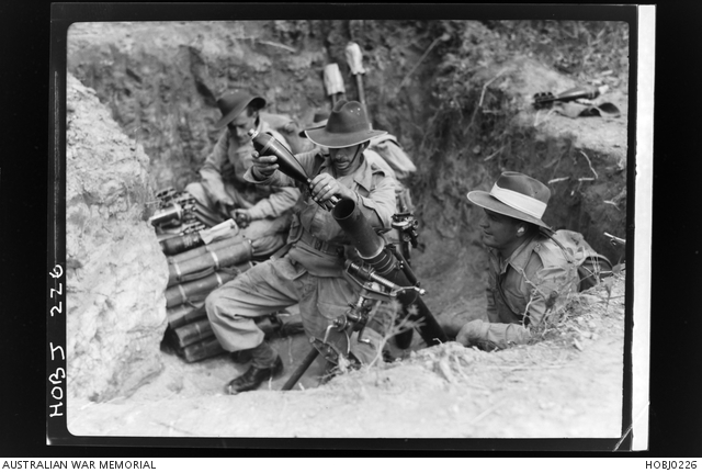 Three unidentified Australian members of British Commonwealth ...