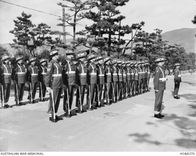 Troops of the 3rd Battalion Royal Australian Regiment (3RAR) standing ...