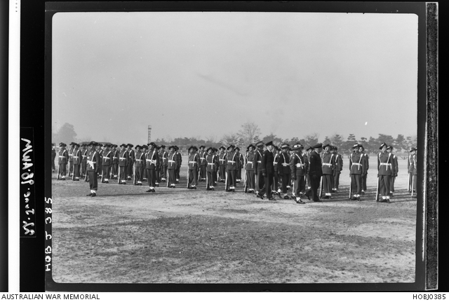 Air Commodore (Air Cdre) A M Charlesworth, inspects Australian troops ...