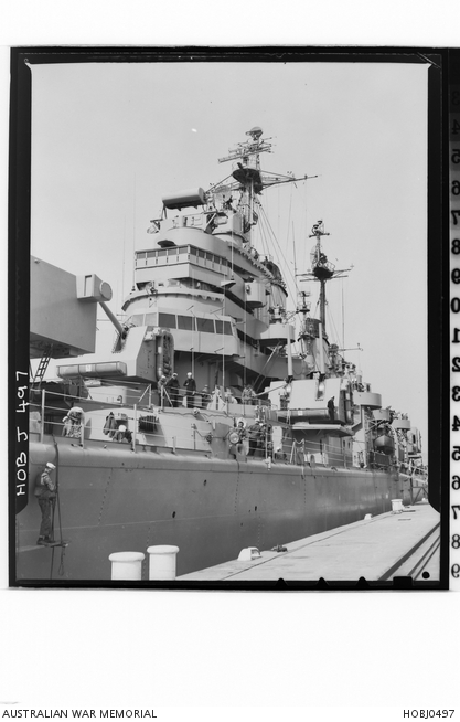 USS Helena (CA-75), a Baltimore Class Heavy Cruiser docked in Kure ...