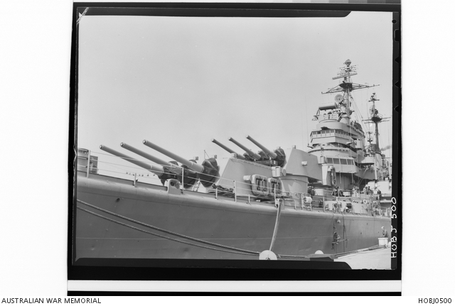 USS Helena (CA-75), a Baltimore Class Heavy Cruiser docked in Kure ...
