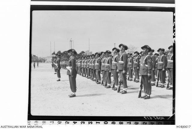 The 3rd Battalion, The Royal Australian Regiment (3RAR), stand at ...