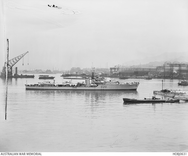 HMS Comus (D20), a Royal Navy destroyer, in Kure Harbour. It was ...