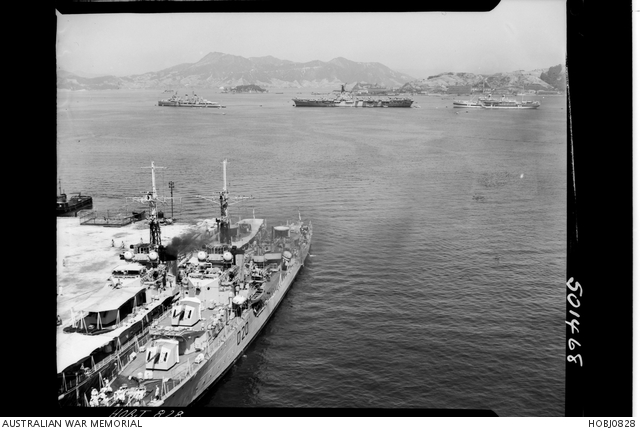 The Royal Navy destroyer HMS Comus (D20), docked alongside an ...
