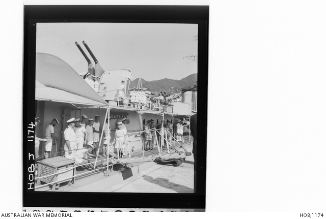 HMAS Bataan tied up in port as her crew waits for the arrival of the ...