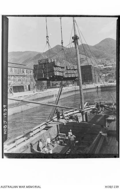Large boxes of explosives, probably for use in the Korean War, are ...