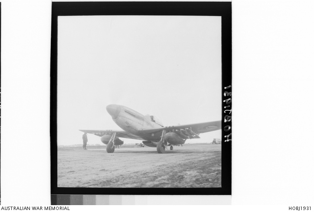 A pilot of 2 Squadron, South African Air Force (SAAF), sits in the ...
