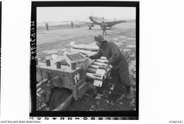 A pilot of 2 Squadron, South African Air Force (SAAF), sits in the ...