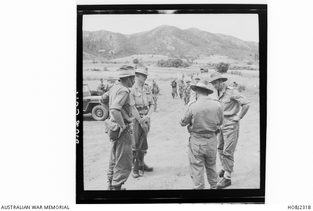 Lieutenant Colonel (Lt Col) Frank Hassett (right), the newly arrived ...
