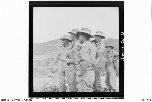 Lieutenant Colonel (Lt Col) Frank Hassett (second from left), the newly ...