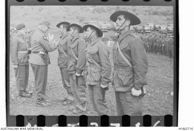 General James Van Fleet, Commanding the 8th US Army (left), decorating ...