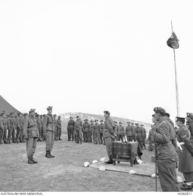 Two members of the Kings Own Scottish Borderers (KOSB) stand at ...