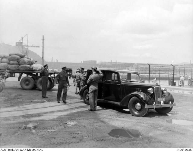 An unidentified Australian Army driver and officer salute as Lieutenant ...