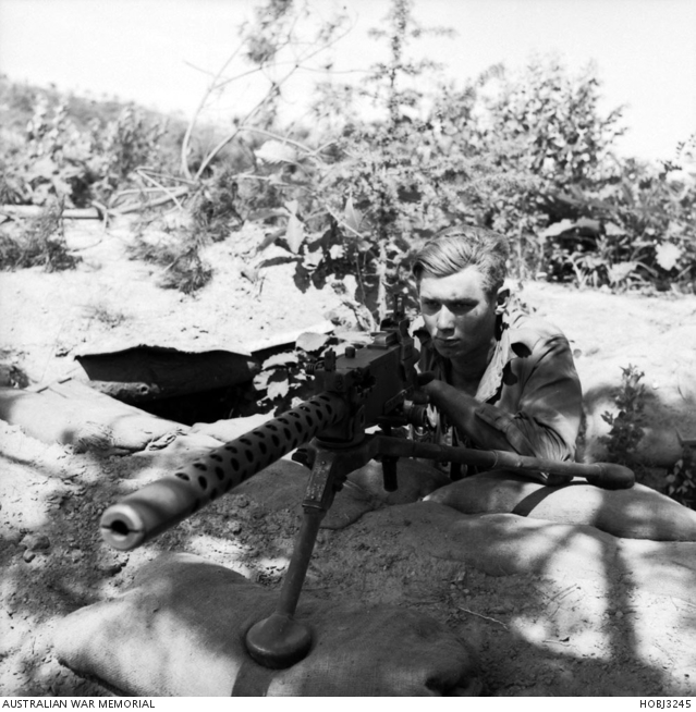 A unidentified machine gunner, probably from the 1st Battalion, The ...