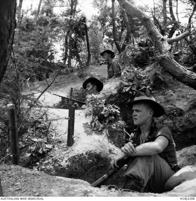 Korea. 16 July 1952. Screened by the trees which camouflage their ...