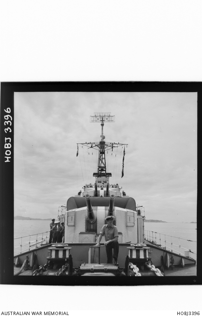 At sea. 1 August 1952. Looking aft from the bow of the Australian ...