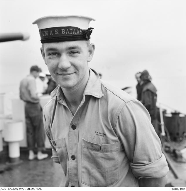 An informal portrait of a seaman on board the destroyer HMAS Bataan. He ...