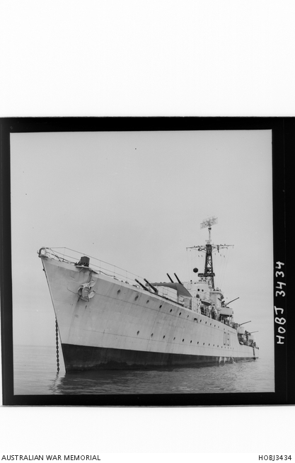 A view of the port side of the RAN destroyer HMAS Bataan at anchor in ...