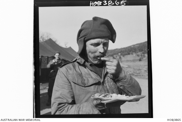 Private D Mancktelow of Homebush, NSW, enjoys his second helping of ...