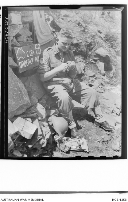 Korea. 14 May 1953. Corporal M. (Tubby) Martin of Malvern, Vic, enjoys ...