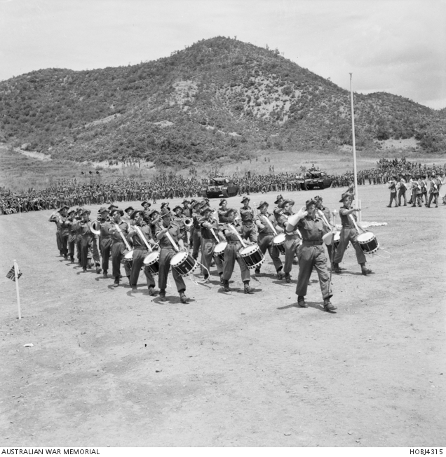 The 2nd Battalion, The Royal Australian Regiment (2RAR) Band, led by ...