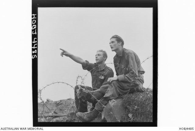 The day after the cease fire Private Pat Butler of Padstow, NSW, points ...