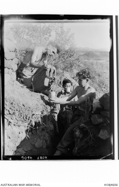 Digging the new defence works out of the rocky hillsides is hot work ...