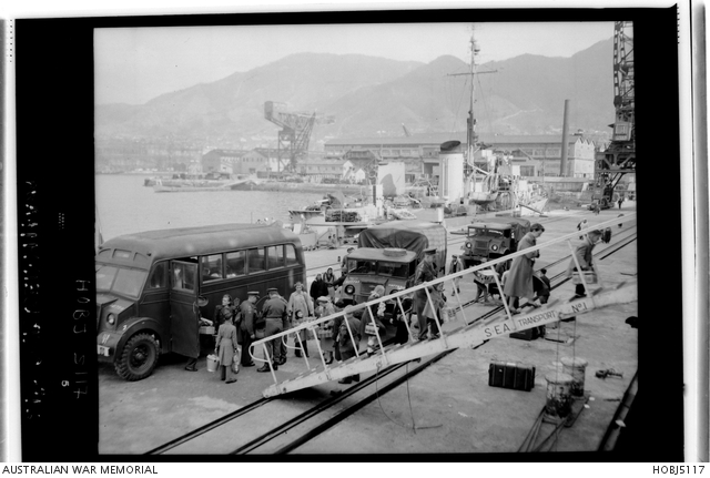 An unidentified Australian Army officer, a civilian woman and young ...
