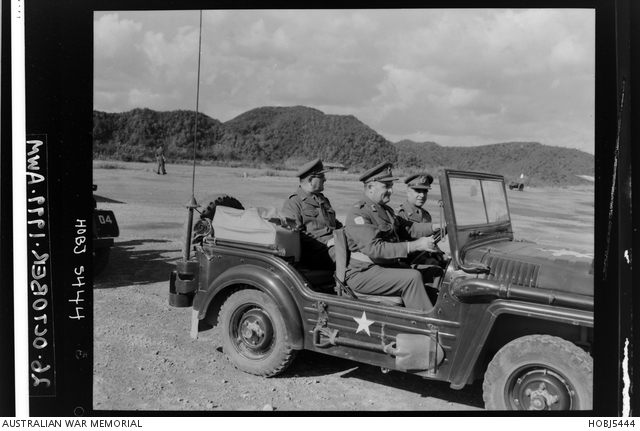 Leaving the airstrip after his arrival at the 1st Commonwealth Division ...