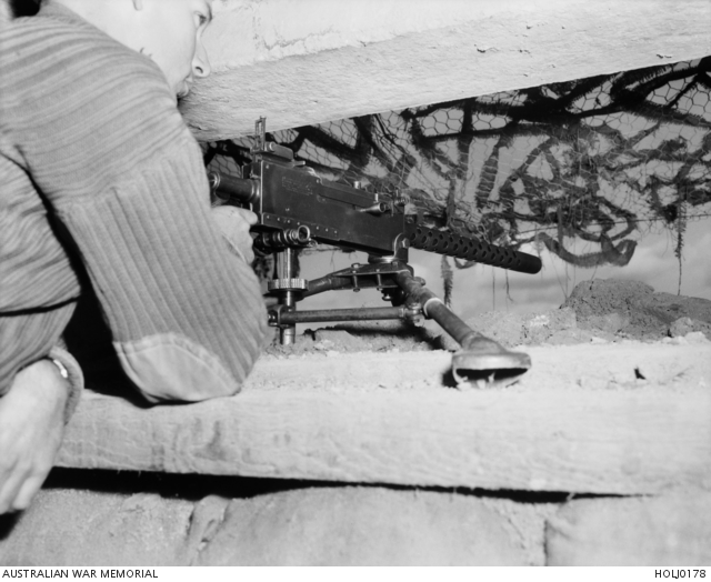 Manning a Browning machine gun in one of the 1st Battalion, The Royal ...