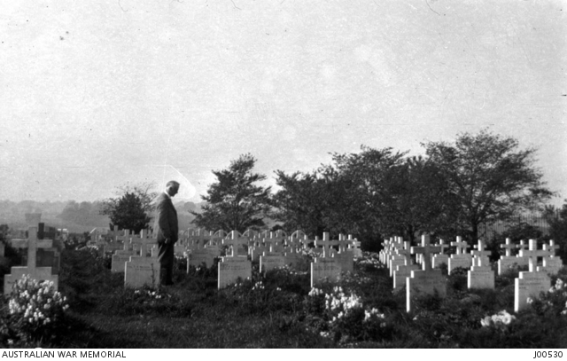 Mr A T Sharp inspecting the 53 Australian graves at Lodge Hill Cemetery ...