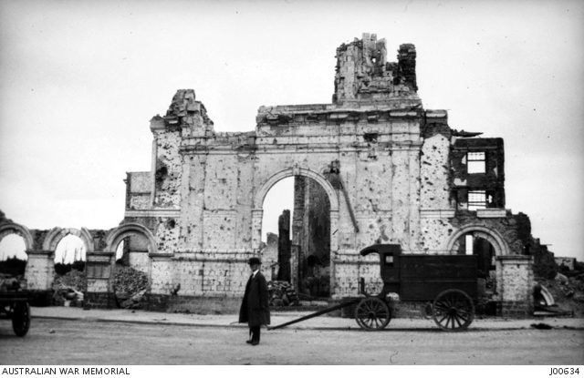 The ruins of a hospital at Ypres, Belgium with Mr A T Sharp in the ...