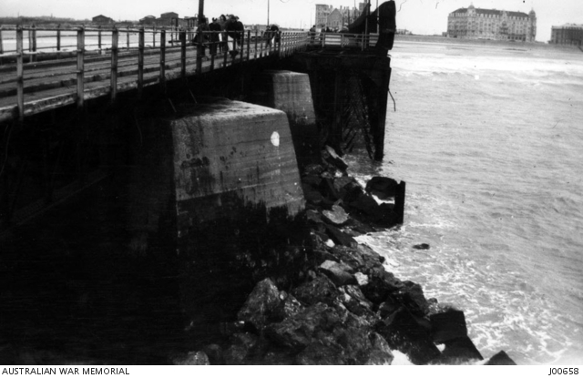 The damaged mole (metal harbour wall joined to the mainland built and ...