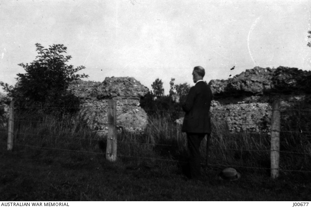 Mr A T Sharp studying the ruined walls of Verulam which was built by ...