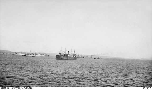 PANORAMIC VIEW OF ANZAC FROM THE SEA, SHOWING TRANSPORTS ARRIVING AND ...