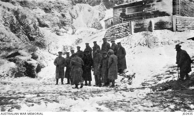 GROUP OF THE OFFICERS OF CORPS HEADQUARTERS STANDING IN FRONT OF ...