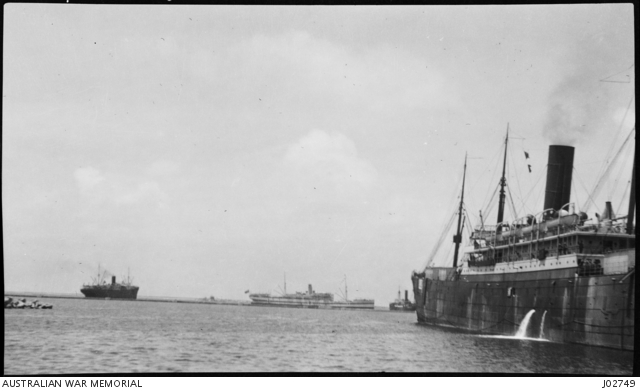 A PHOTOGRAPH TAKEN FROM THE DECK OF A TRANSPORT IN MUDROS HARBOUR IN ...