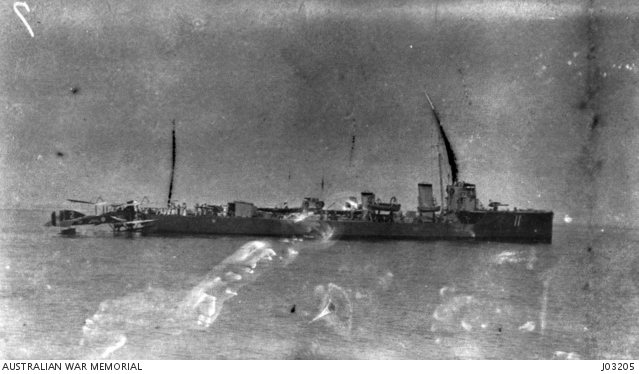 A DISABLED BRITISH SEAPLANE BEING ASSISTED BY A DESTROYER IN THE ...