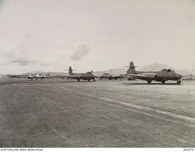KIMPO, SOUTH KOREA. 1951-07. METEORS OF NO. 77 SQUADRON RAAF TAXIING ...